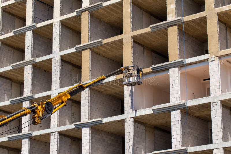 Construction of Multi-storey Building. Cradle Mobile Stock Photo ...