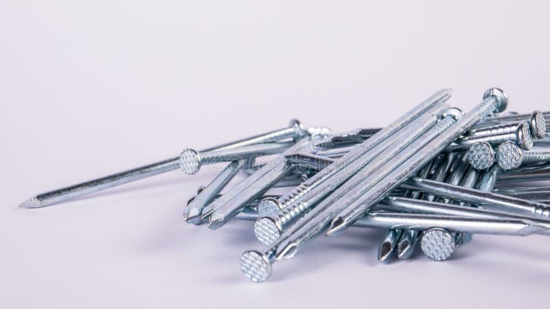 Construction Nails during the Construction of a Wooden House. Stock ...