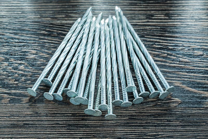 Construction Nails on Wooden Board Stock Photo - Image of nails, wooden ...