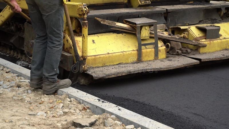Construction of a New Asphalt Concrete Road. Stock Video - Video of ...