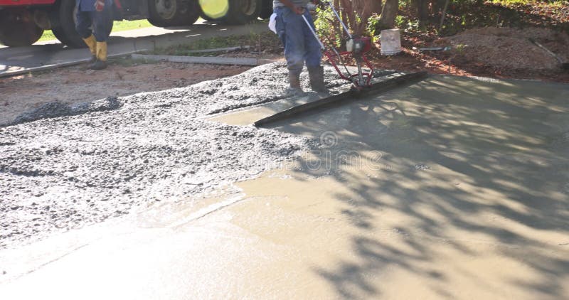 In the Construction of a New Driveway, a Machine is Used To Align Fresh ...