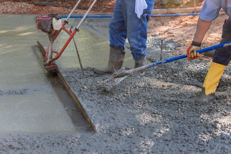 In the Construction of a New Driveway, a Machine is Used To Align Fresh ...