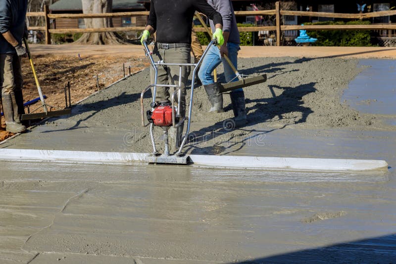 During the Construction of a New Driveway, a Machine is Used To Align ...