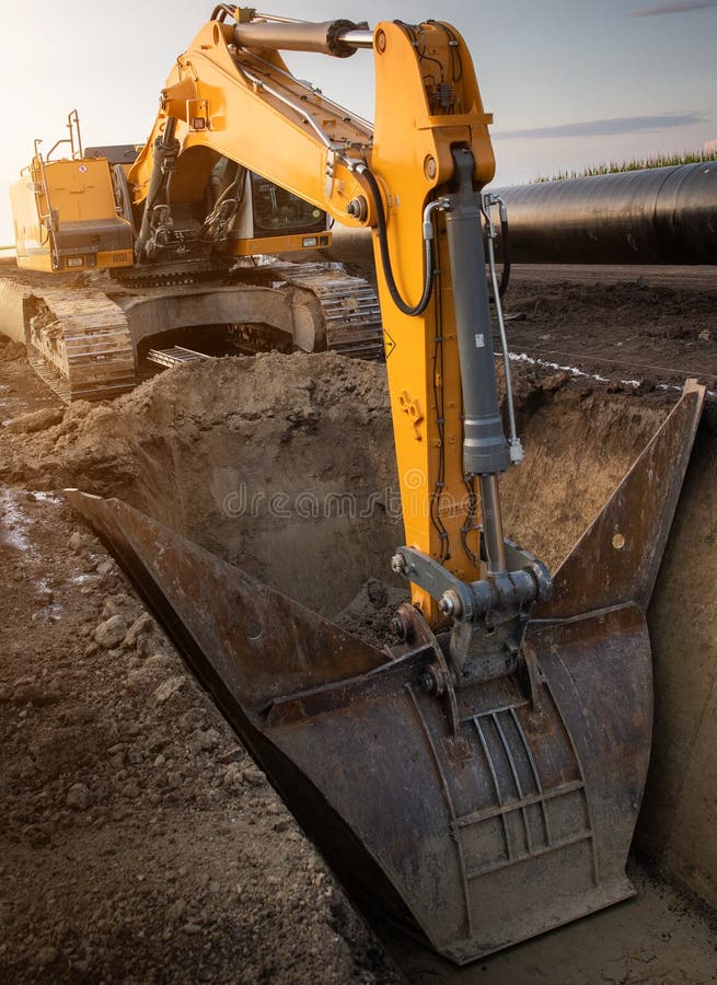 Crane Digging a Channel for Gas Pipeline Stock Photo - Image of ditch ...