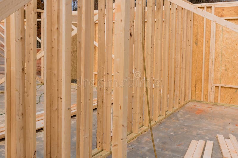 Construction of New Home Involves Use of Stick Beams, Wood, a Framing ...