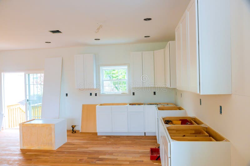 In Construction of a New House, Custom Kitchen Cabinets are Installed ...