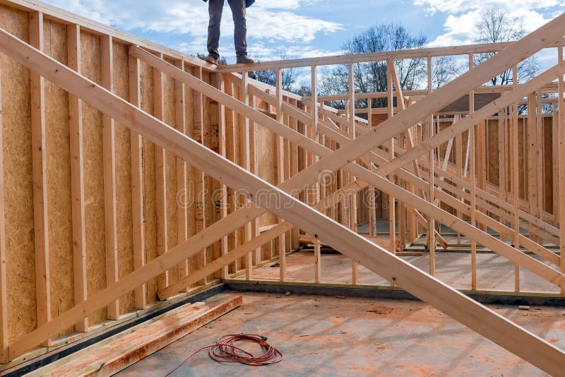 In the Construction of a New House, the Wood Framing Beams of the House ...