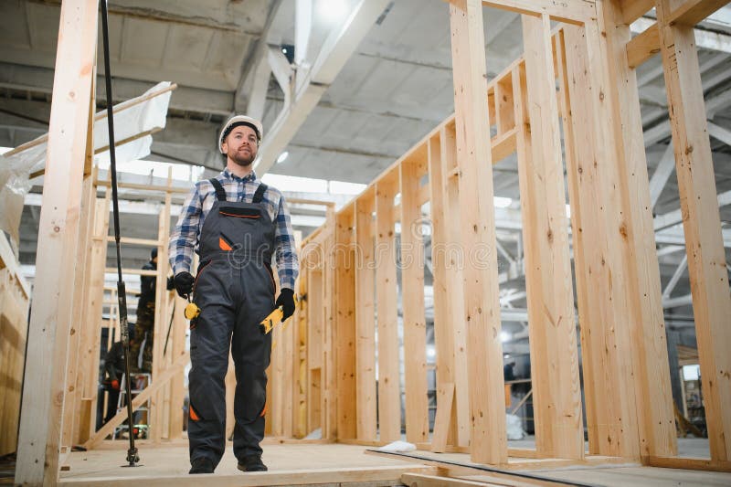 Construction New and Modern Modular House. Worker Man in Protective ...