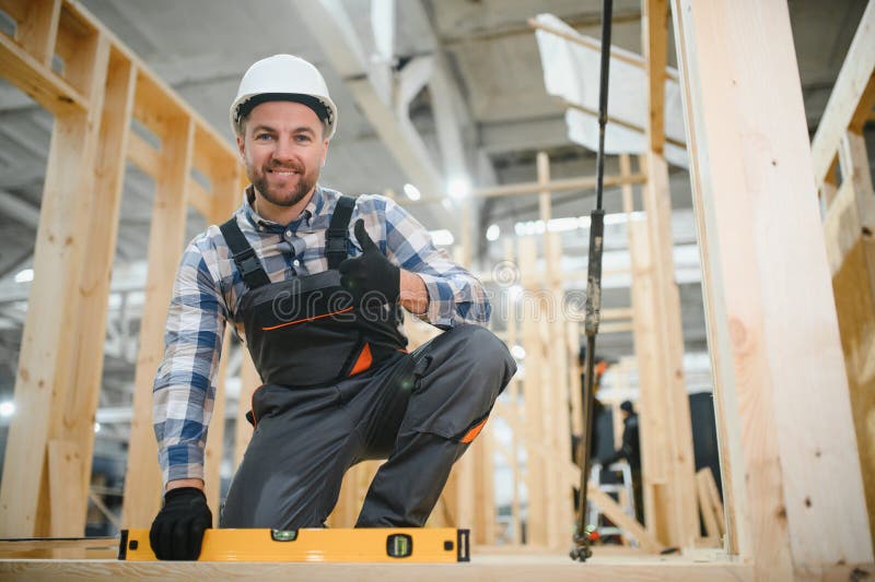 Construction New and Modern Modular House. Worker Man in Protective ...