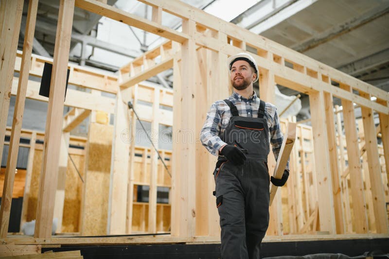 Construction New and Modern Modular House. Worker Man in Protective ...
