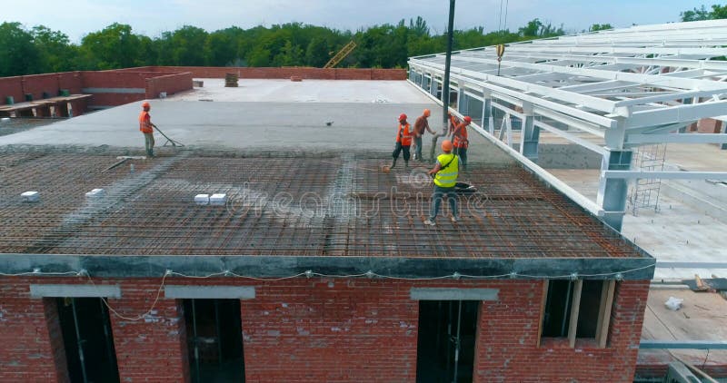 Workers Create Concrete Formwork. Concrete Slab Creation. Construction ...