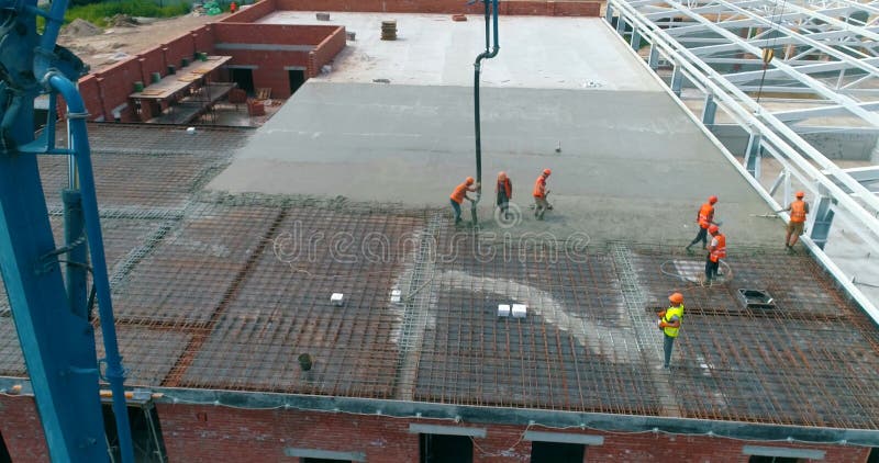 Workers Create Concrete Formwork. Concrete Slab Creation. Construction ...