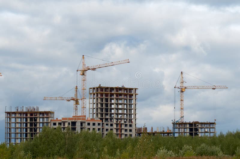 Construction of New Residential Buildings: Construction Site with Crane ...