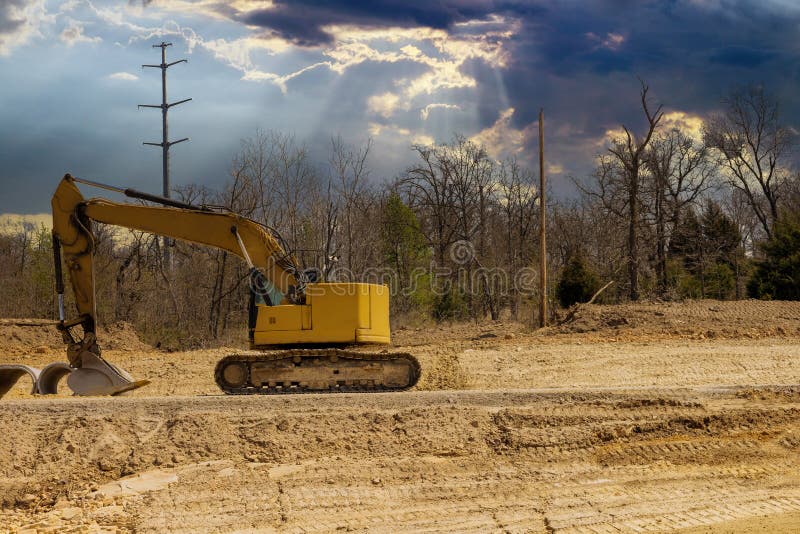 Construction of New Road in a Excavator Digs the Ground the View Under ...