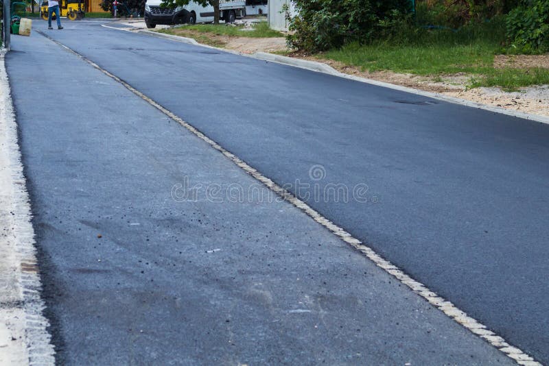 Construction of a new road stock photo. Image of laying - 185544208