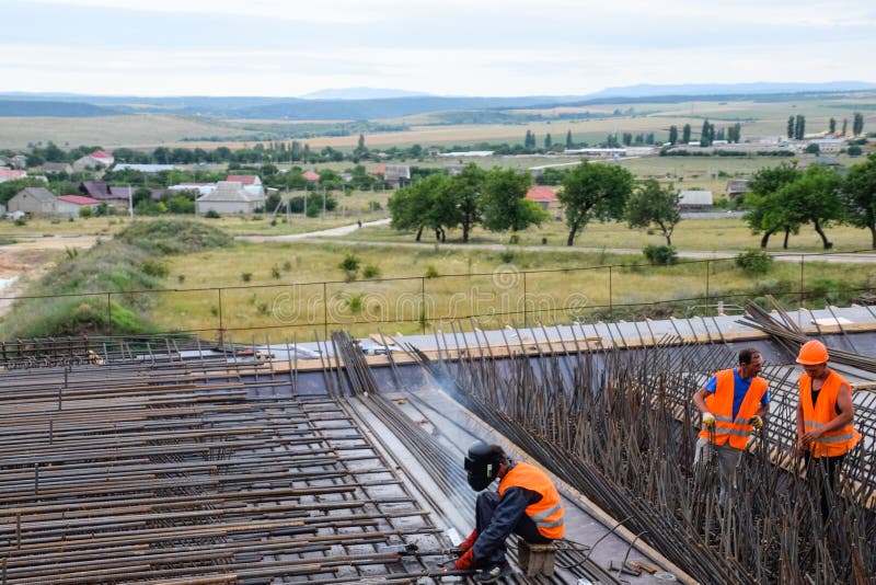Construction of New Road and Transport Interchange. Work on Reinforced ...