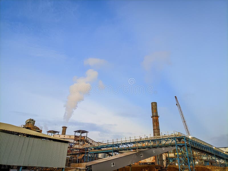 Construction of a Nickel Processing Plant. Blue Sky Background Stock ...