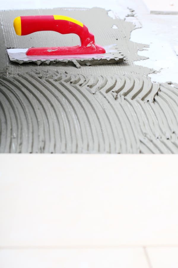 Construction Notched Trowel with Mortar for Tiles Work Stock Image ... Construction Notched Trowel with Mortar for Tiles Work Stock Image ...