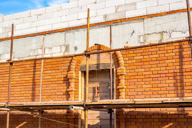 Construction of an Old-style Building with Arched Windows Stock Photo ...