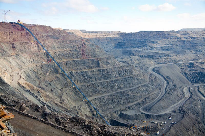 Ore mining stock photo. Image of mountains, muddy, earth - 19354076