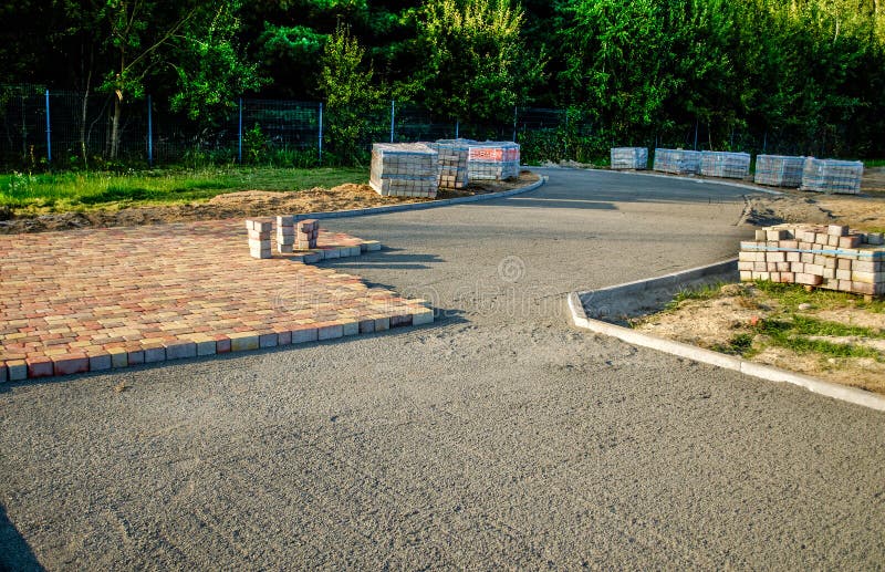 Construction of Pavement of Coloured Concrete Blocks Stock Photo ...