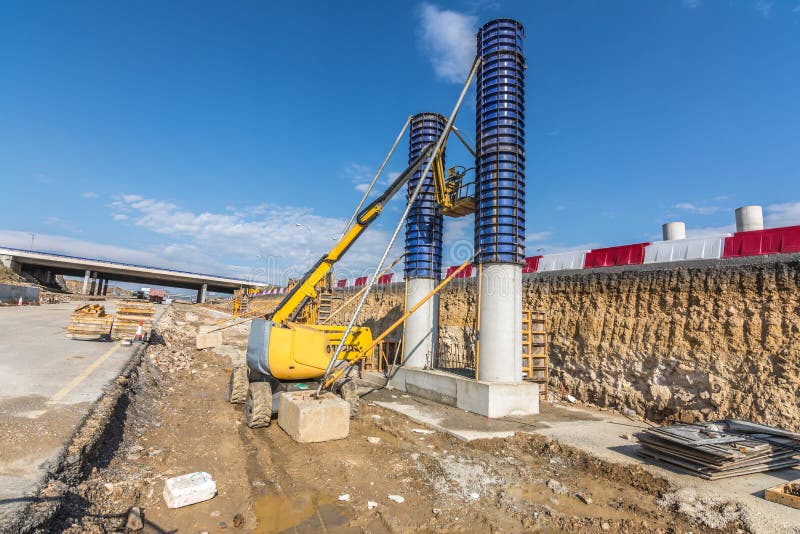 Construction of the Pillars of a Bridge with a Lifting Platform. Stock ...