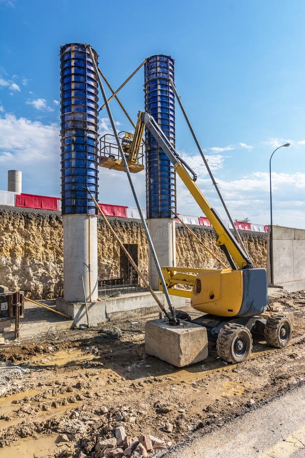 Construction of the Pillars of a Bridge with a Lifting Platform. Stock ...