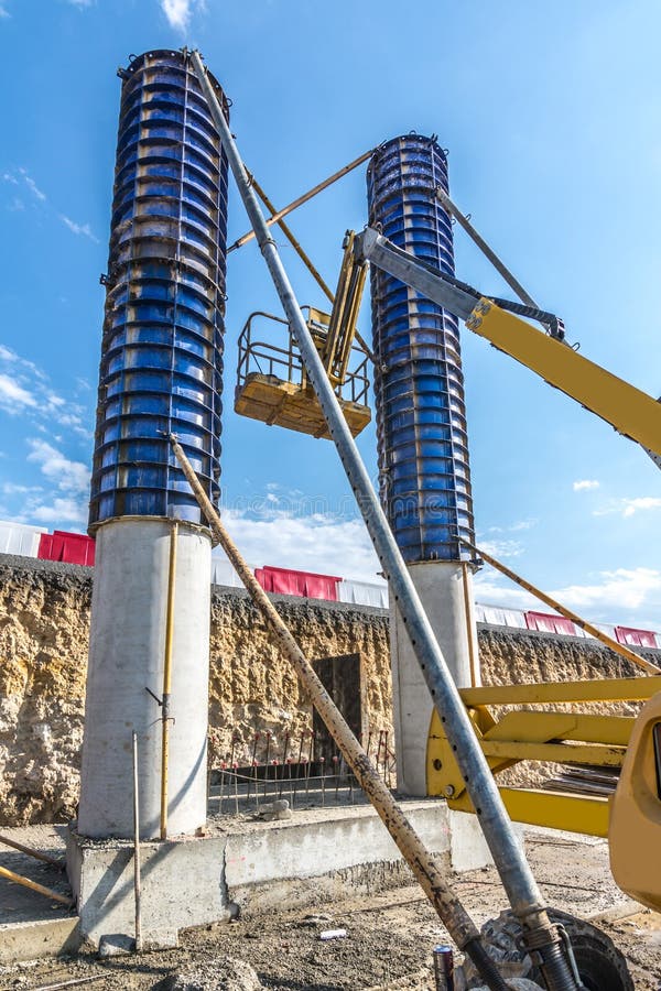 Construction of the Pillars of a Bridge with a Lifting Platform. Stock ...