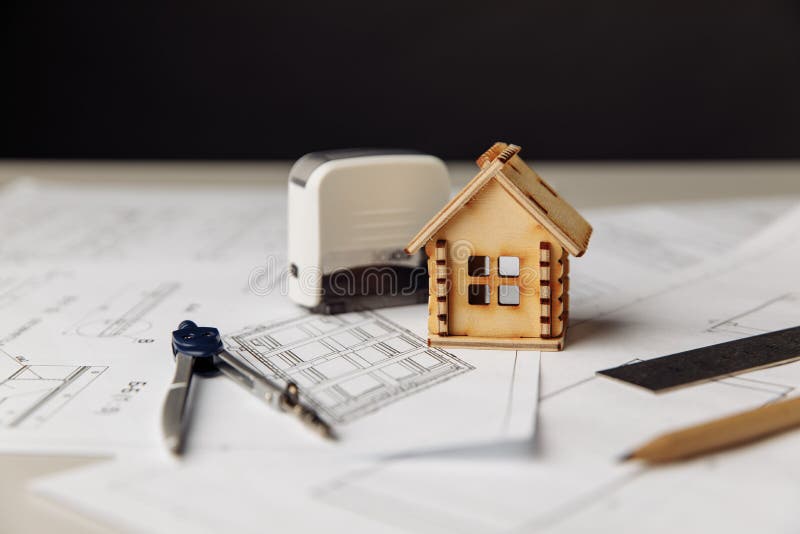 Construction Plan with Wooden Model of House, Drawing Tools and Stamp ...