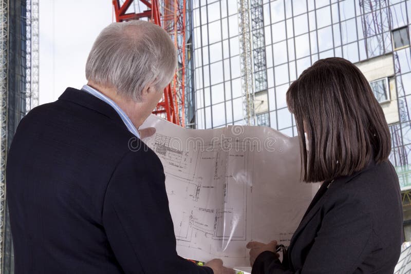 Construction plans stock image. Image of businessman - 14201551