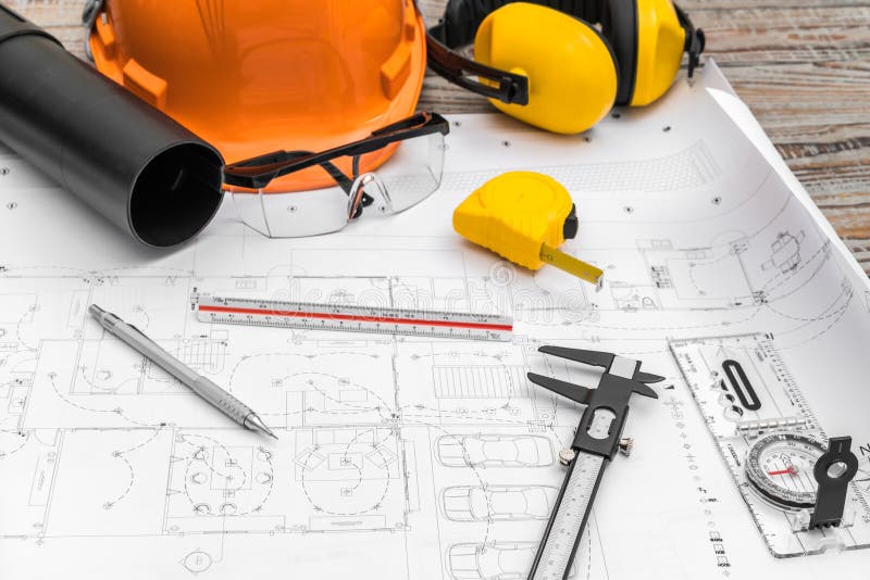 Construction Plans with Helmet and Drawing Tools on Blueprints . Stock ...