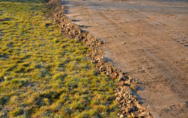 Construction Preparation by Leveling and Soil Compaction by Vibrating ...