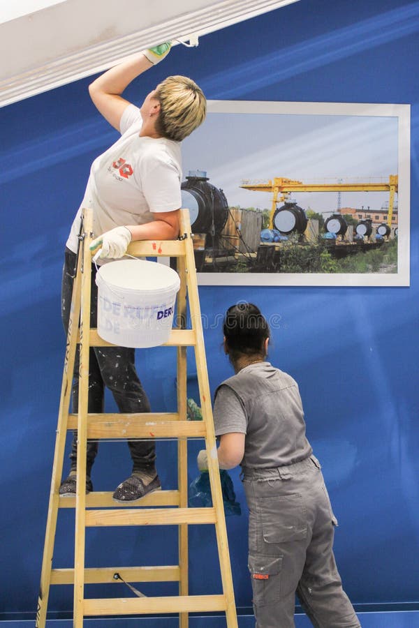 Painters at work. editorial photography. Image of plasterer - 104242972