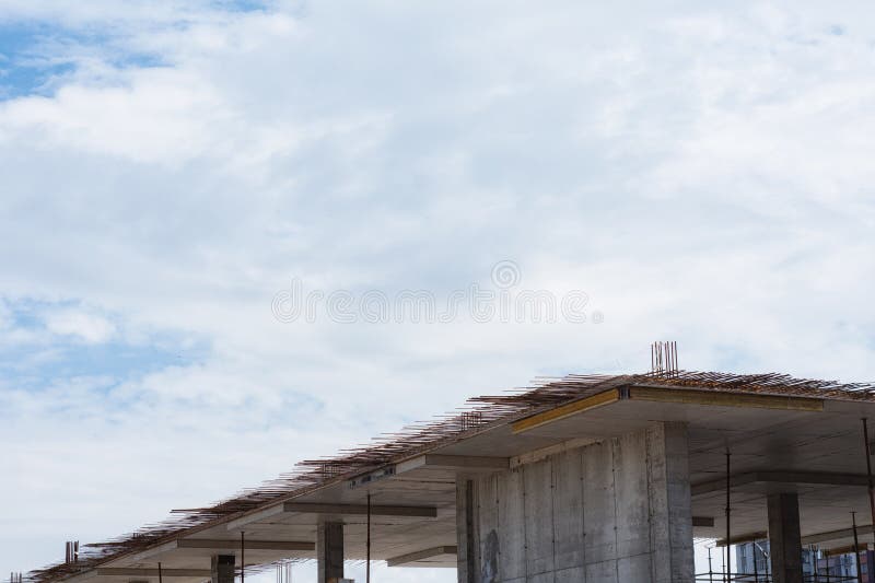 Construction Process of a Concrete Building with Exposed Rebar and ...