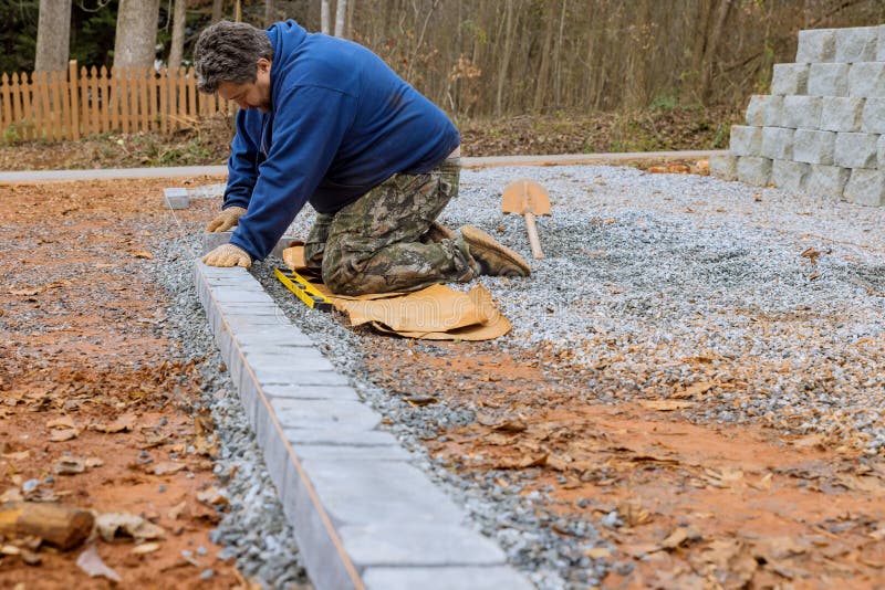 During the Construction Process, a Construction Worker Arranges Precast ...