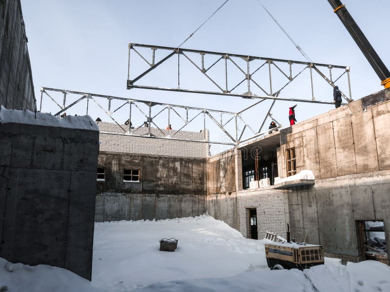 The construction process editorial photography. Image of builders ...