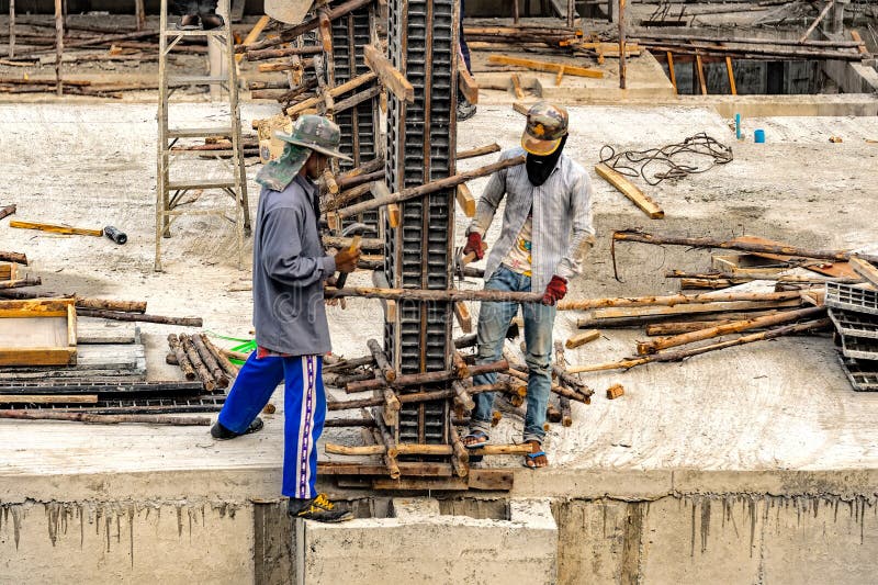 Construction in Progress. Men at Work. Editorial Image - Image of ...
