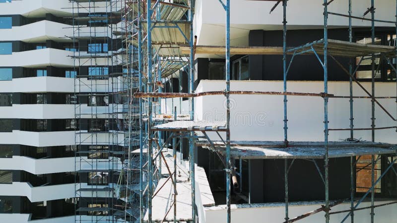 Construction Progress of a Modern Residential Building with Scaffolding ...