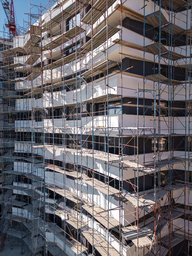 Construction Progress of a Modern Residential Building with Scaffolding ...