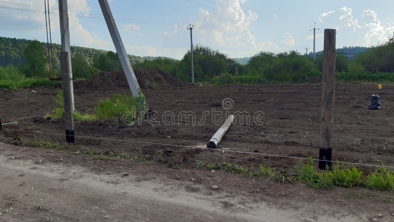 Construction Progress at a Rural Site with Cleared Land and Utility ...