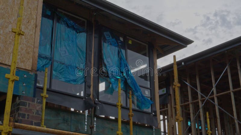 Construction Progress: Unfinished Roof Guttering Windows Framework on ...