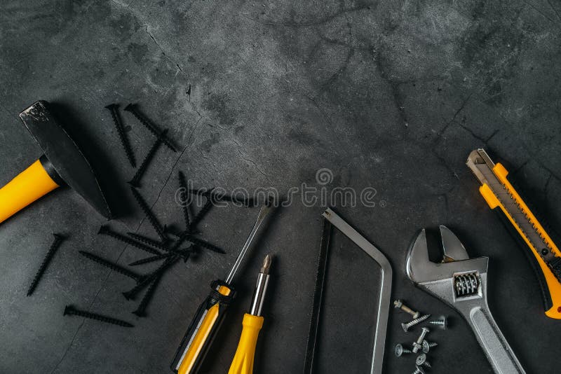 Construction and Repair Tools on a Dark Background with Space for Text ...
