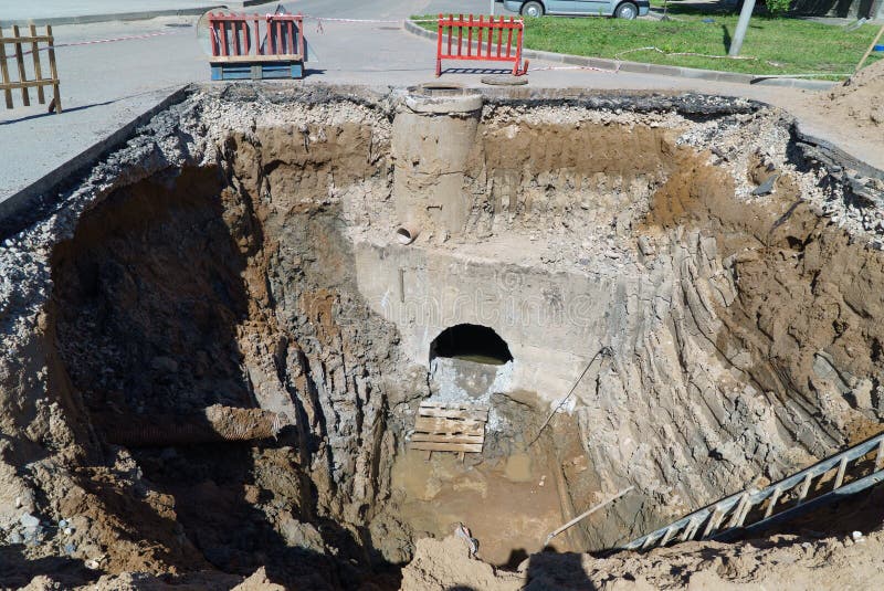 Construction. Replace the Manifold in the Deep Pit Stock Image - Image ...