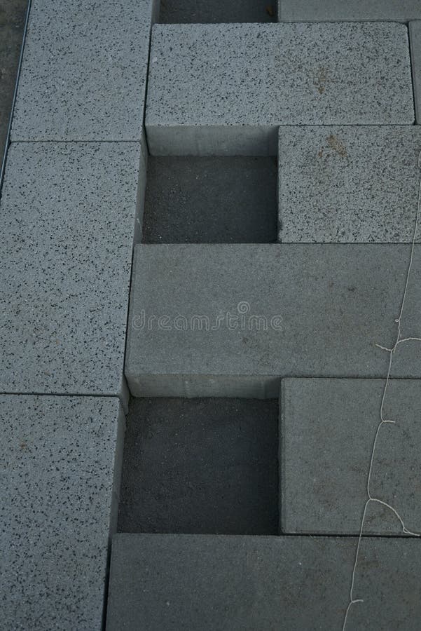 Construction of a Road Made of Stone Blocks in a Park in a Megalopolis ...