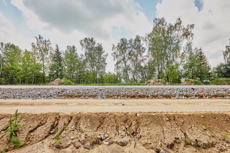 Construction of a Road with Rubble and Sand Stock Photo - Image of pave ...