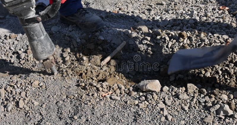 Construction Road Workers Using Jackhammer Digging the Concrete Surface ...