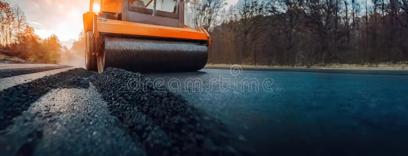 Construction Roller Machine Flattening Fresh Asphalt on the Road at ...