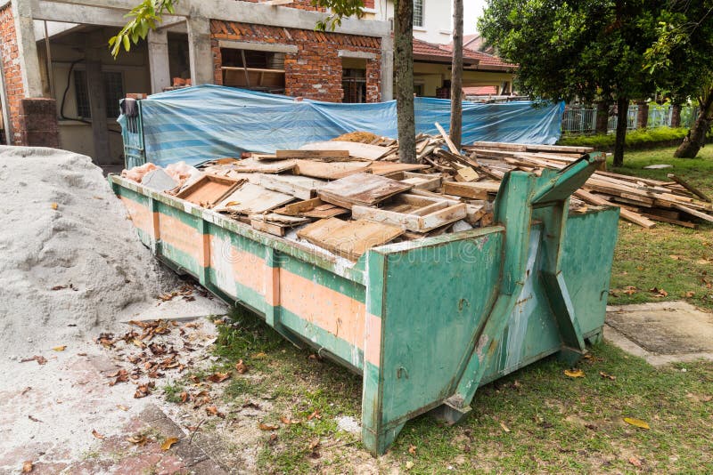 Construction Rubbish Bin with Loads at Construction Site Stock Photo ...