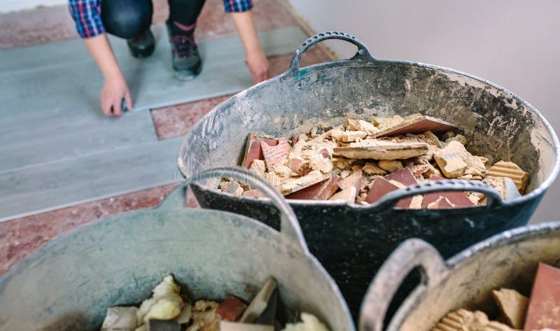 Construction Rubble Buckets with Unrecognizable Female Bricklayer ...