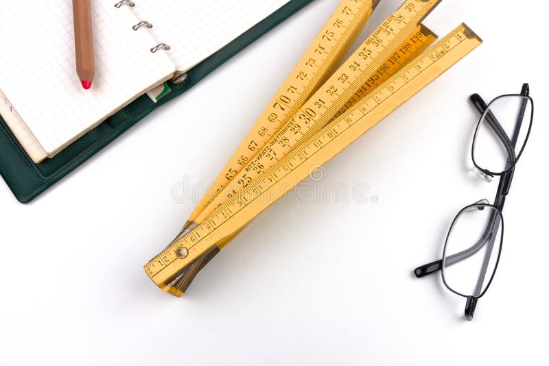 Construction Ruler Isolated on White Background on Table Stock Photo ...